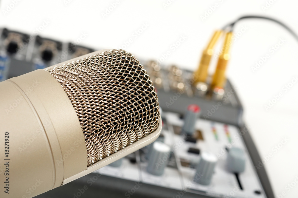 Studio microphone on the audio control console background Stock Photo ...