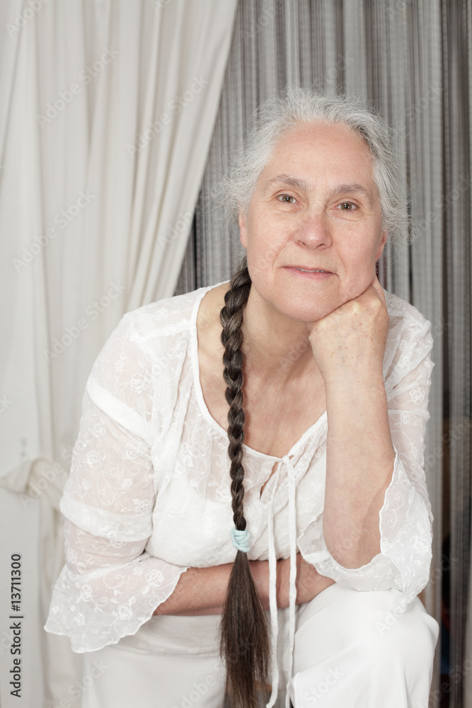 Old lady with her long braid Stock Photo | Adobe Stock