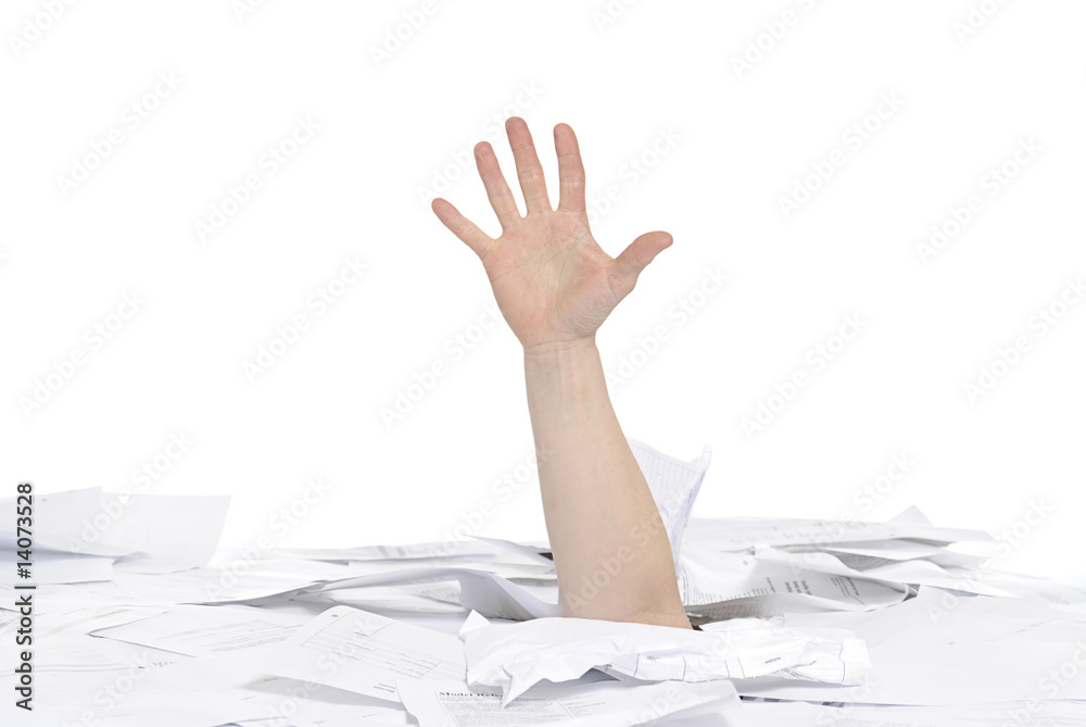 hand drowning in paper work Stock Photo | Adobe Stock