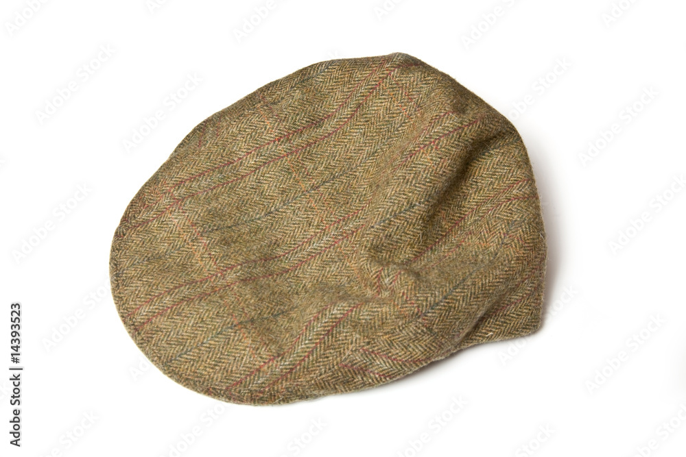 Flat cap isolated on a white studio background. Stock Photo | Adobe Stock