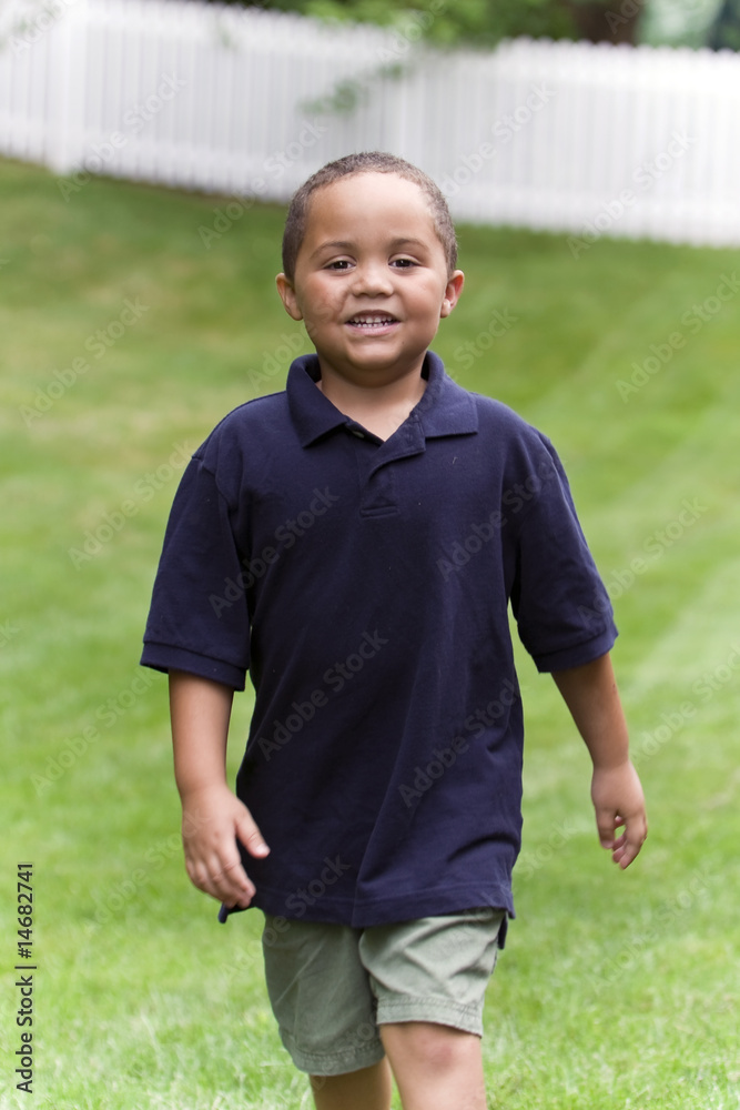 Boy walking Stock Photo | Adobe Stock