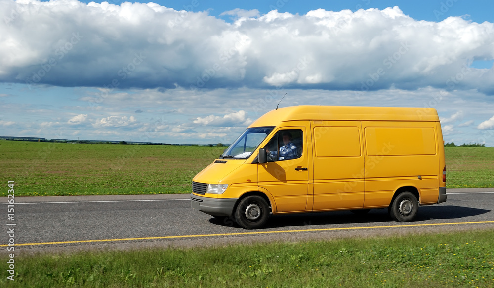 yellow delivery truck Stock Photo | Adobe Stock
