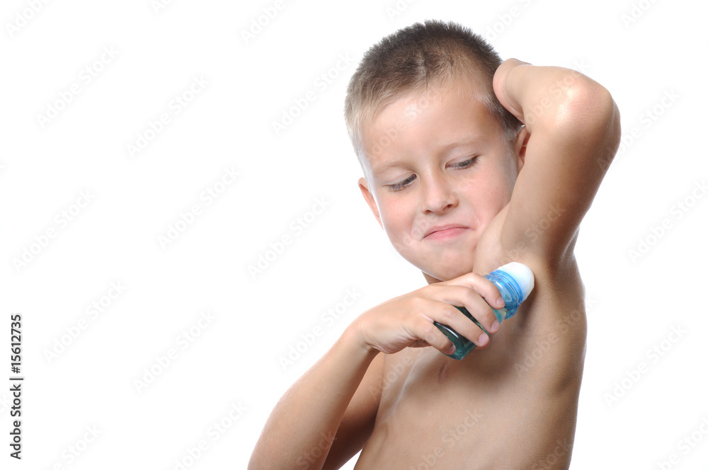 handsome young man applying deodorant Stock Photo | Adobe Stock