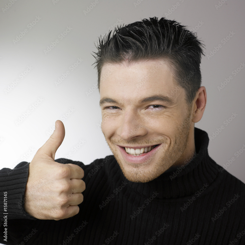 homme satisfaction pouce en l'air Photos | Adobe Stock