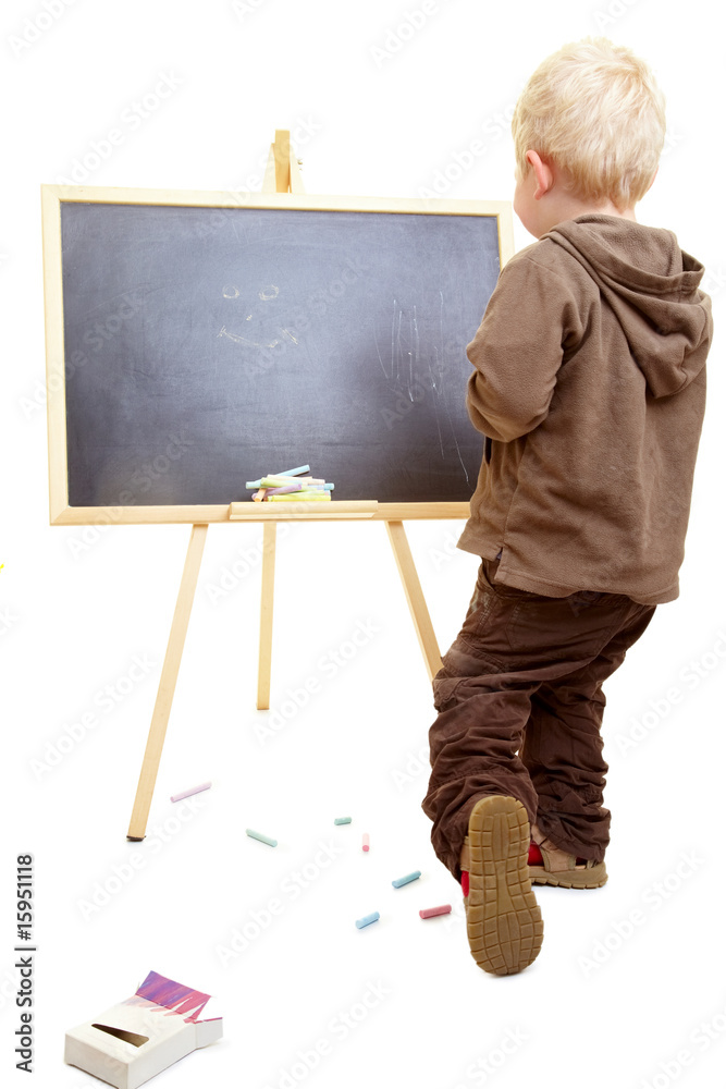 Kind an Tafel Stock Photo | Adobe Stock