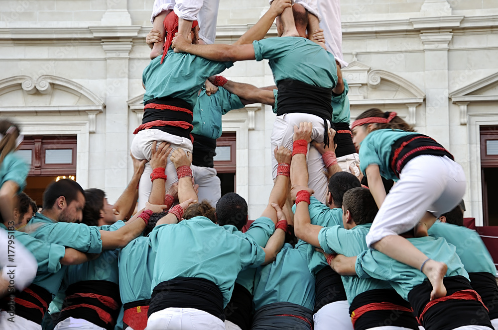 Human castle. Symbol of teamwork and good fellowship. Stock Photo ...