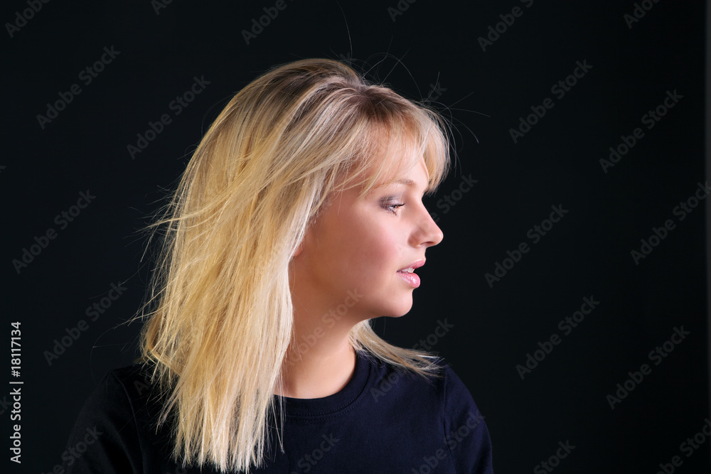 Beautiful blonde side view portrait Stock Photo | Adobe Stock