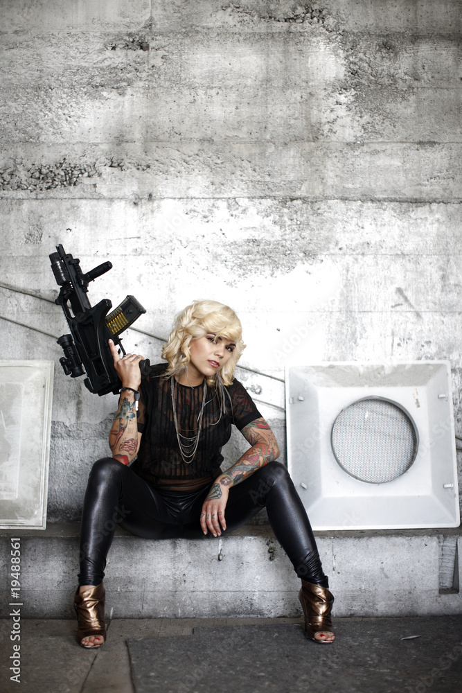 Sexy woman with assault rifle Stock Photo | Adobe Stock