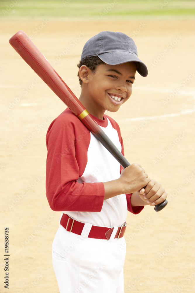 Young Boy Playing Baseball Stock Photo | Adobe Stock