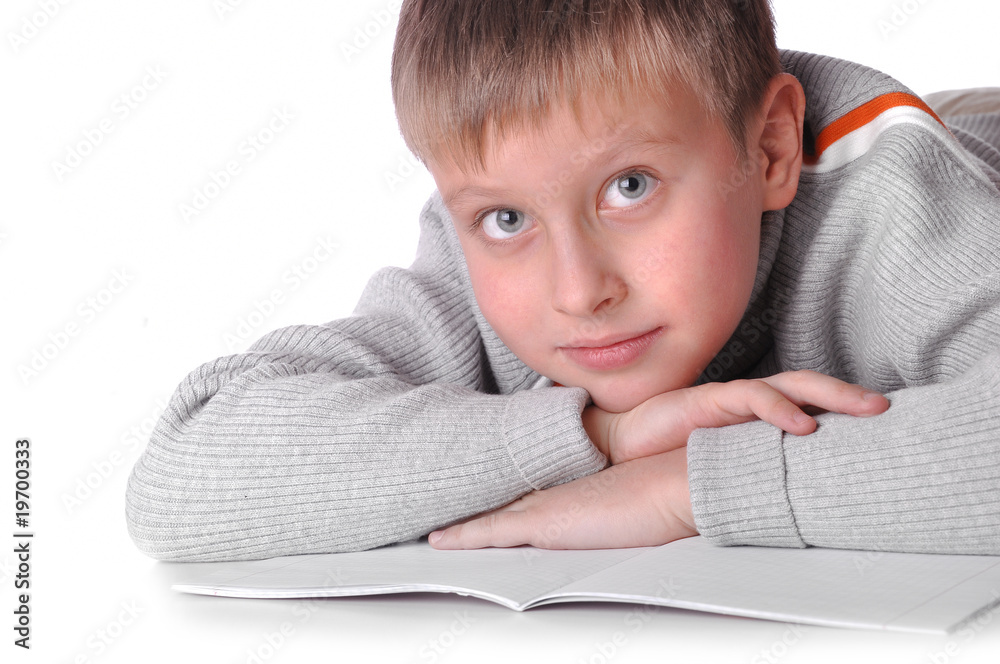 Young boy laying on the floor isolated over a white background Stock ...