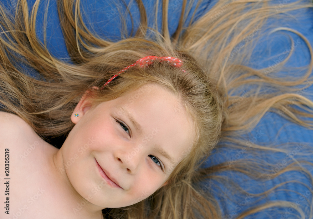 Little girl sunbathing Stock Photo | Adobe Stock
