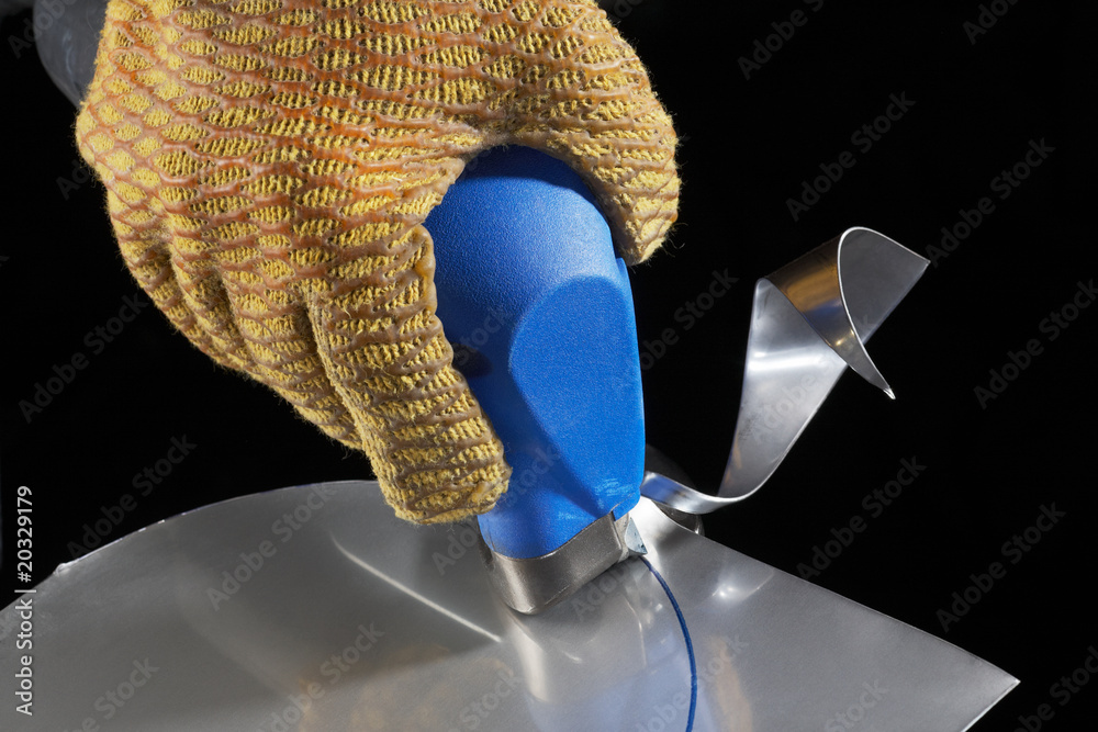 curved cut with an electric powered snips Stock Photo | Adobe Stock