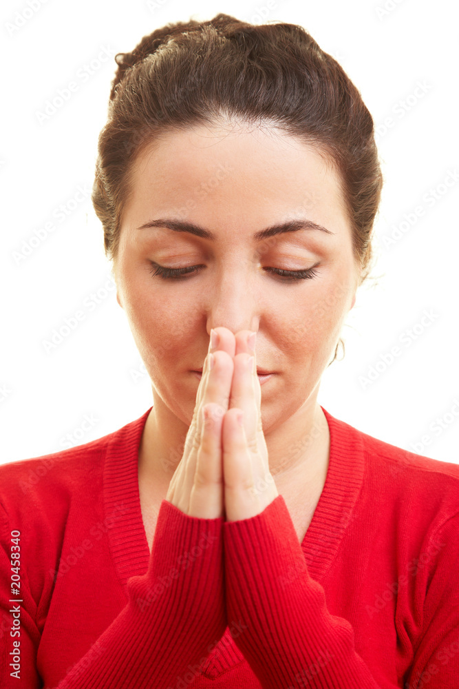 Woman praying Stock Photo | Adobe Stock