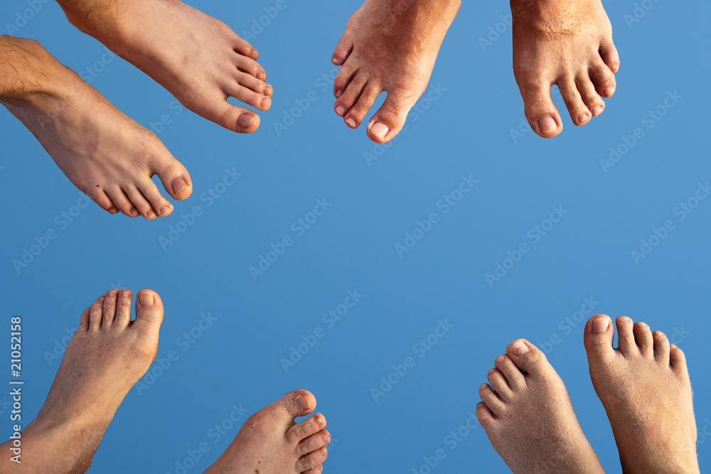 feet of the family, father, mother and two suns with blue sky Stock ...