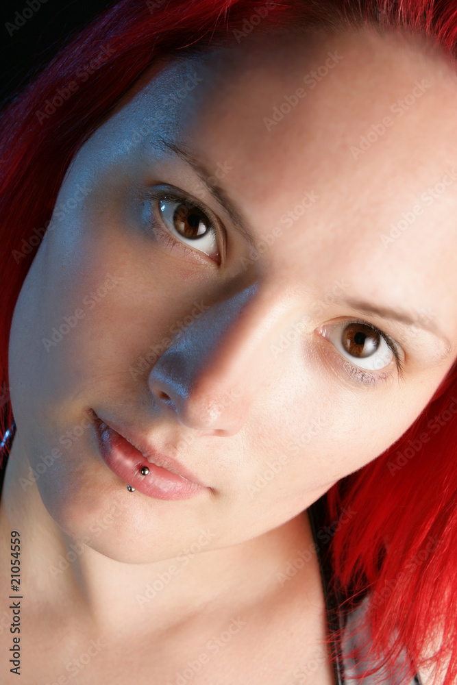 Das Gesicht einer Frau mit Piercing in der Lippe Stock Photo | Adobe Stock