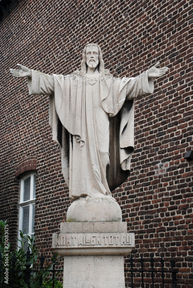 Statue welcoming Jesus Christ with open arms Stock Photo | Adobe Stock