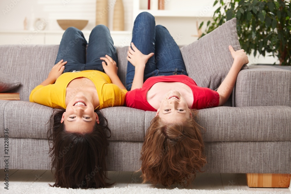 Teen girls upside down Stock Photo | Adobe Stock