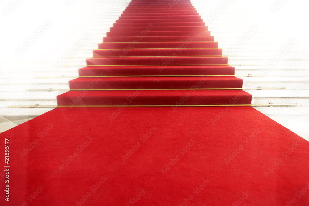 Staircase with red carpet, illuminated by light Stock Photo | Adobe Stock