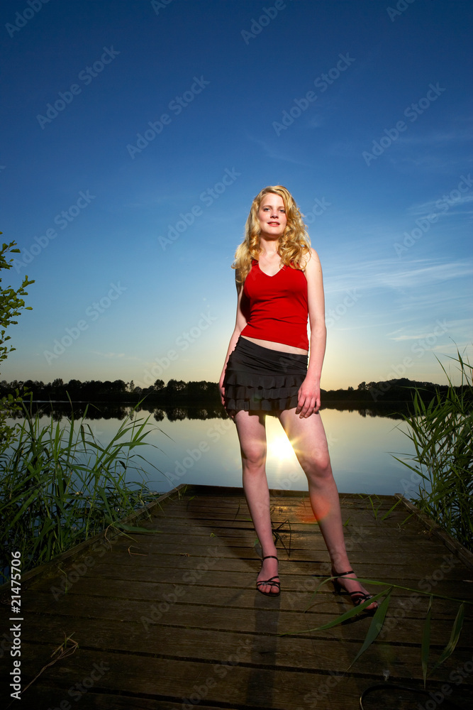 Blondine mit Abendsonne Stock Photo | Adobe Stock