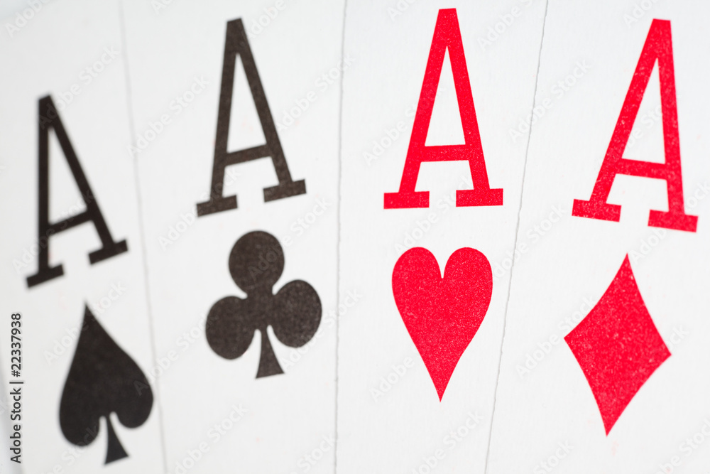 Foto de Playing cards close up. Four ases of all colours. do Stock ...