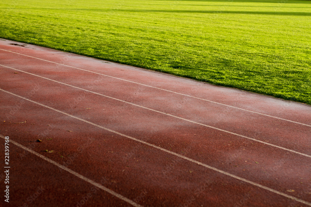race track and soccer field in stadion Stock Photo | Adobe Stock
