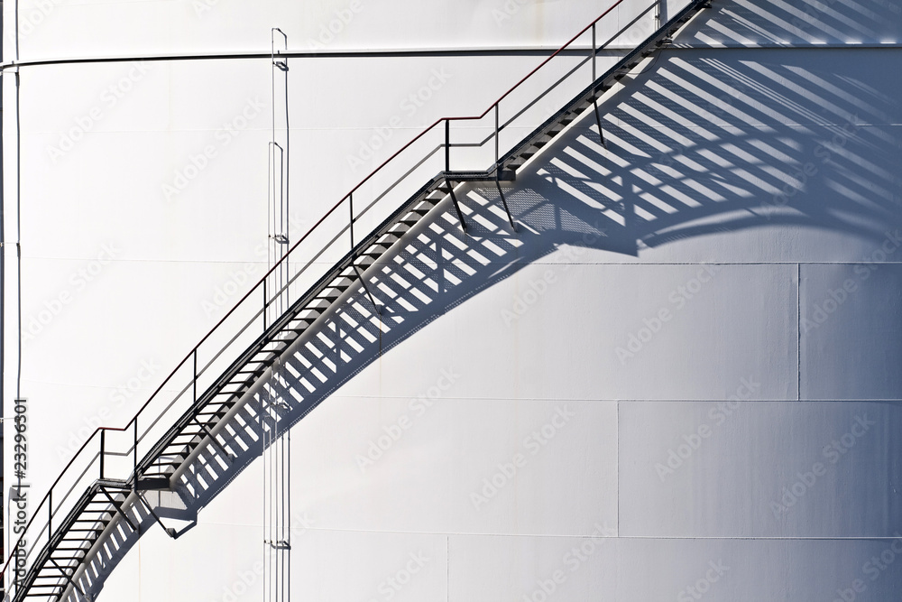 white tanks in tank farm with staircase Stock Photo | Adobe Stock