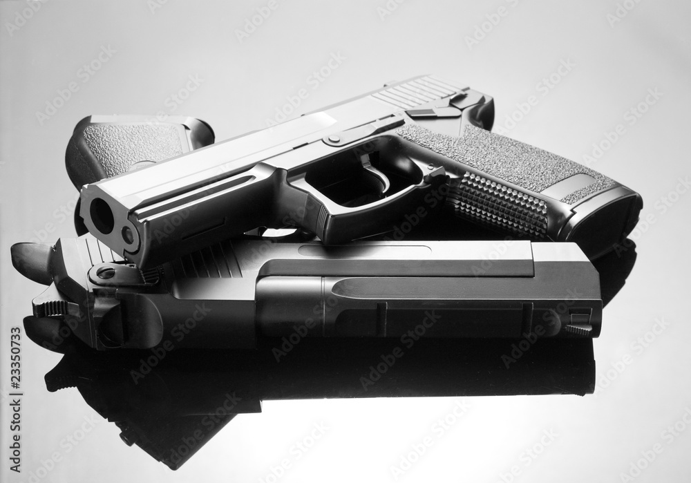 Two handguns Stock Photo | Adobe Stock