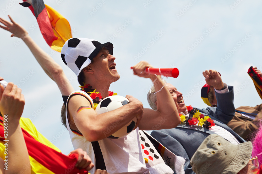 Enthusiastische Fußballfans im Stadion Stock Photo | Adobe Stock