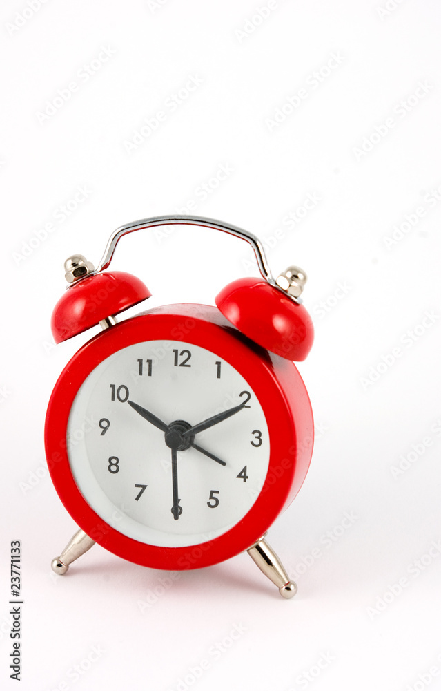 red alarm clock Stock Photo | Adobe Stock