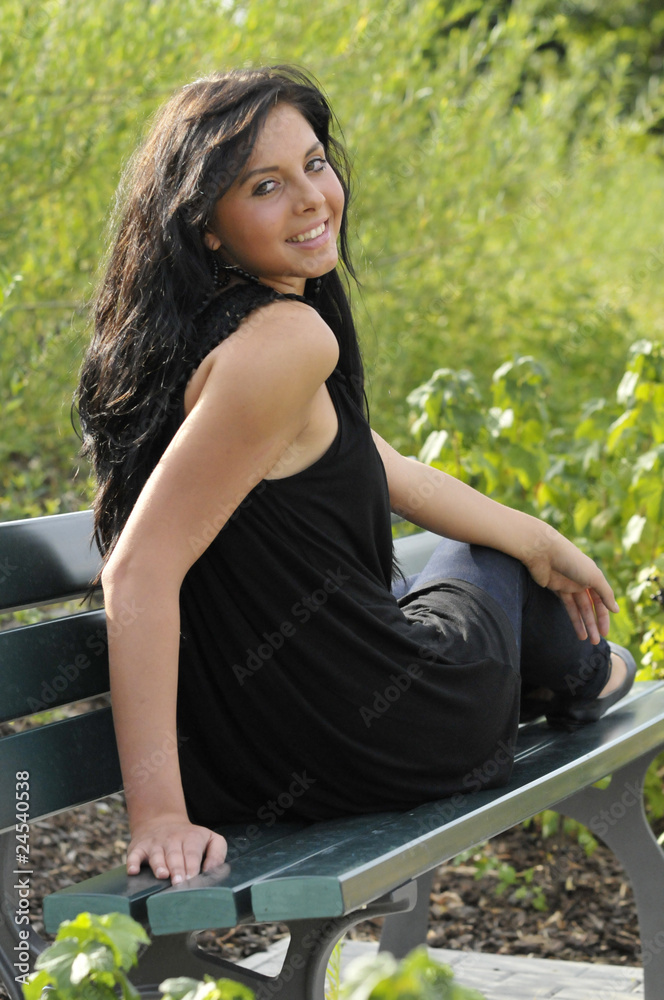 girl sitting on the bench Stock Photo | Adobe Stock
