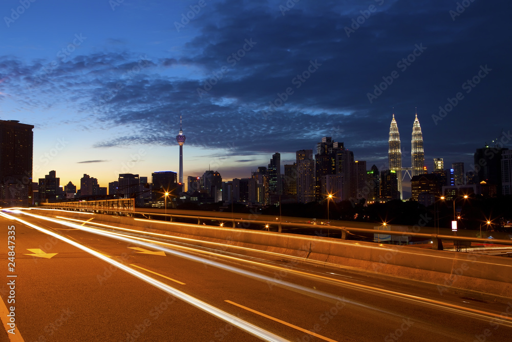 Kuala Lumpur cityscape, with Petronas towers illuminated. Stock Photo ...