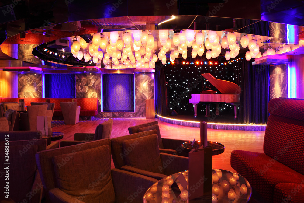 grand piano at concert stage in restaurant with many lamps Stock Photo ...