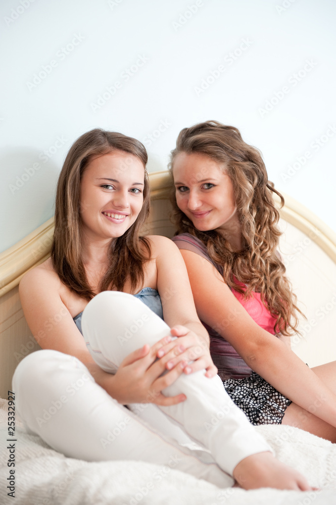 Two girls in bed Stock Photo | Adobe Stock