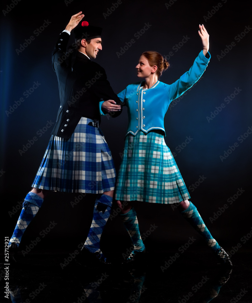 The pair dancing the Scottish dance in a kilt Stock Photo | Adobe Stock