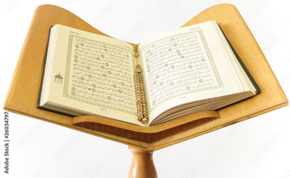 Open Quran on a stand with beads Stock Photo | Adobe Stock