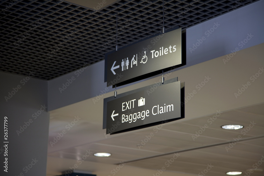 Direction signs in an airport terminal for travelers Stock Photo ...
