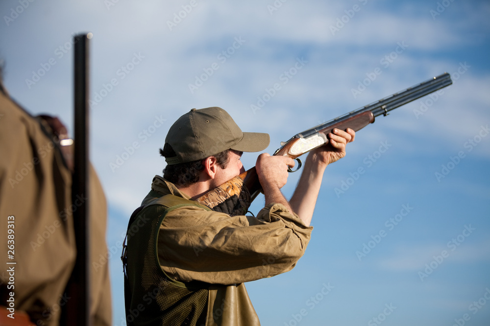 Hunter aiming at the hunt during a hunting party Stock Photo | Adobe Stock
