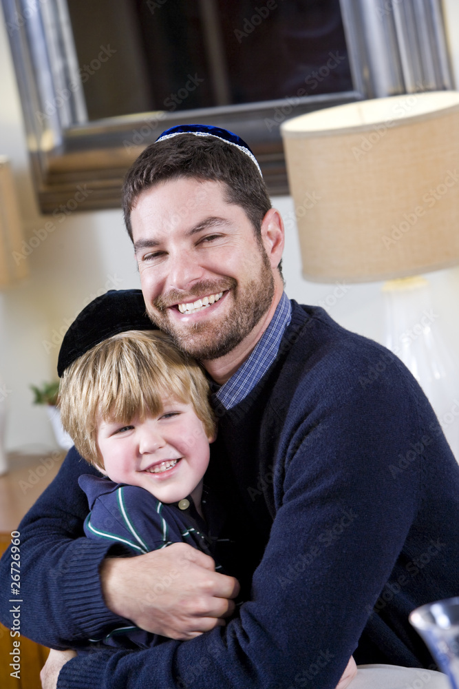 Jewish father and young son wearing yarmulkes Stock Photo | Adobe Stock