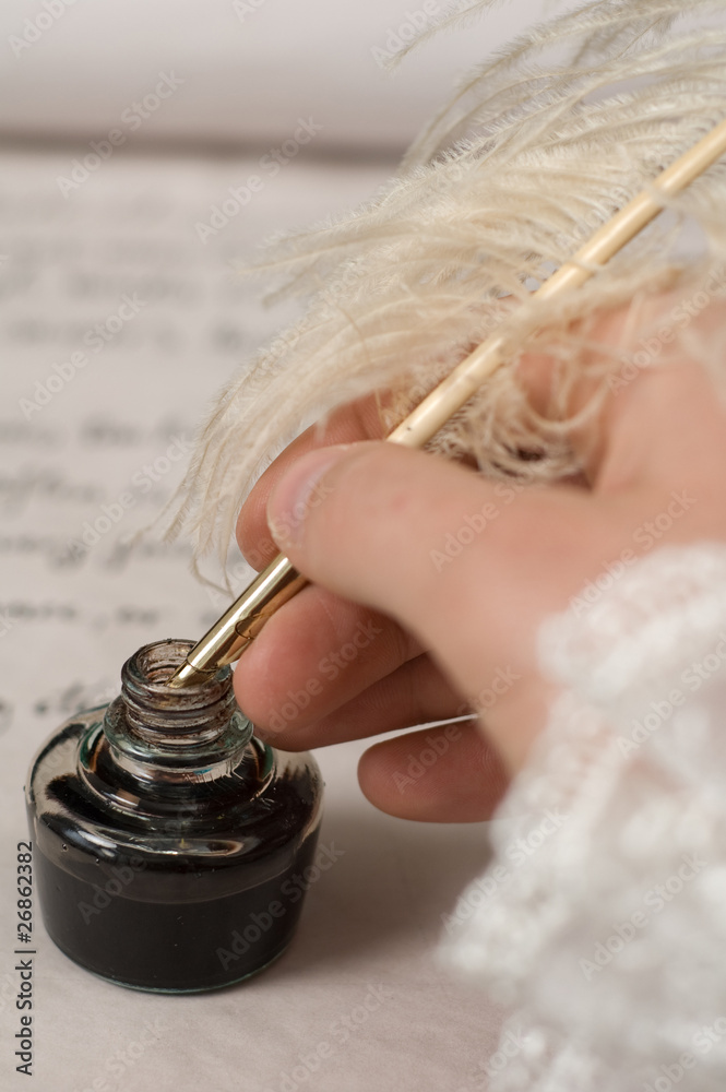 Writing with feather pen Stock Photo | Adobe Stock