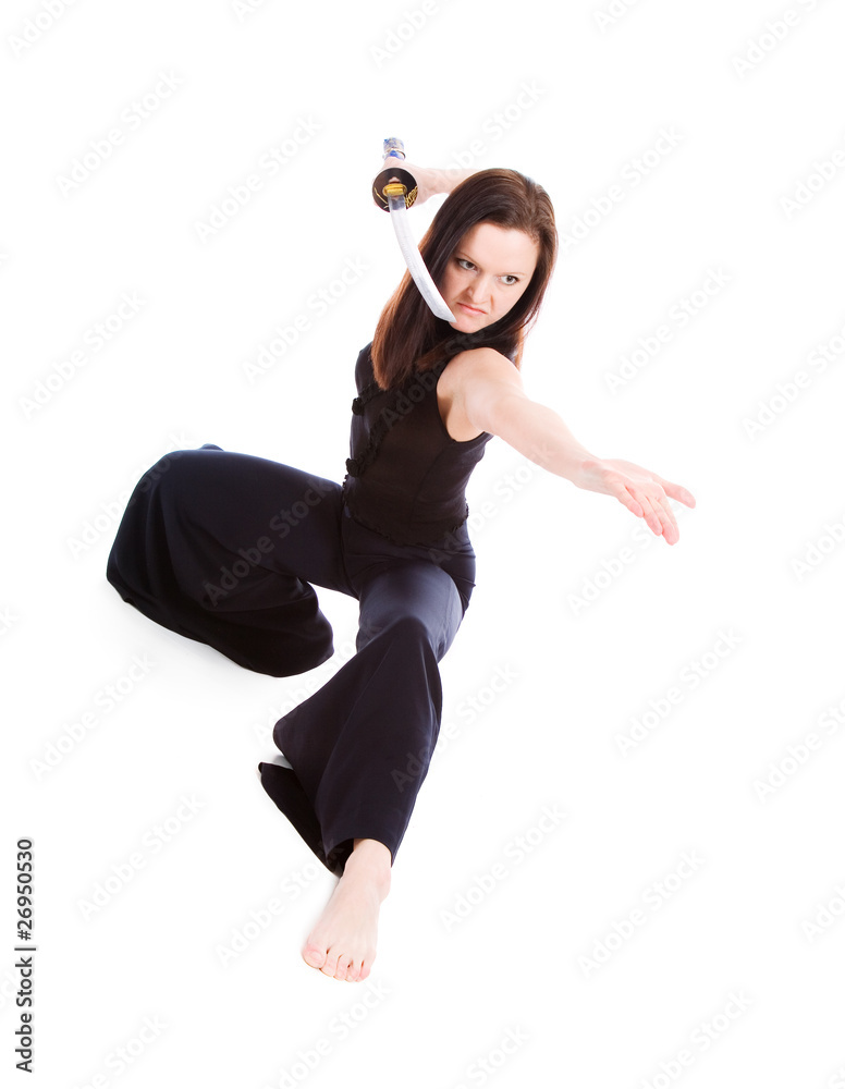 Beautiful woman in an aggressive posture with a sword katana Stock ...