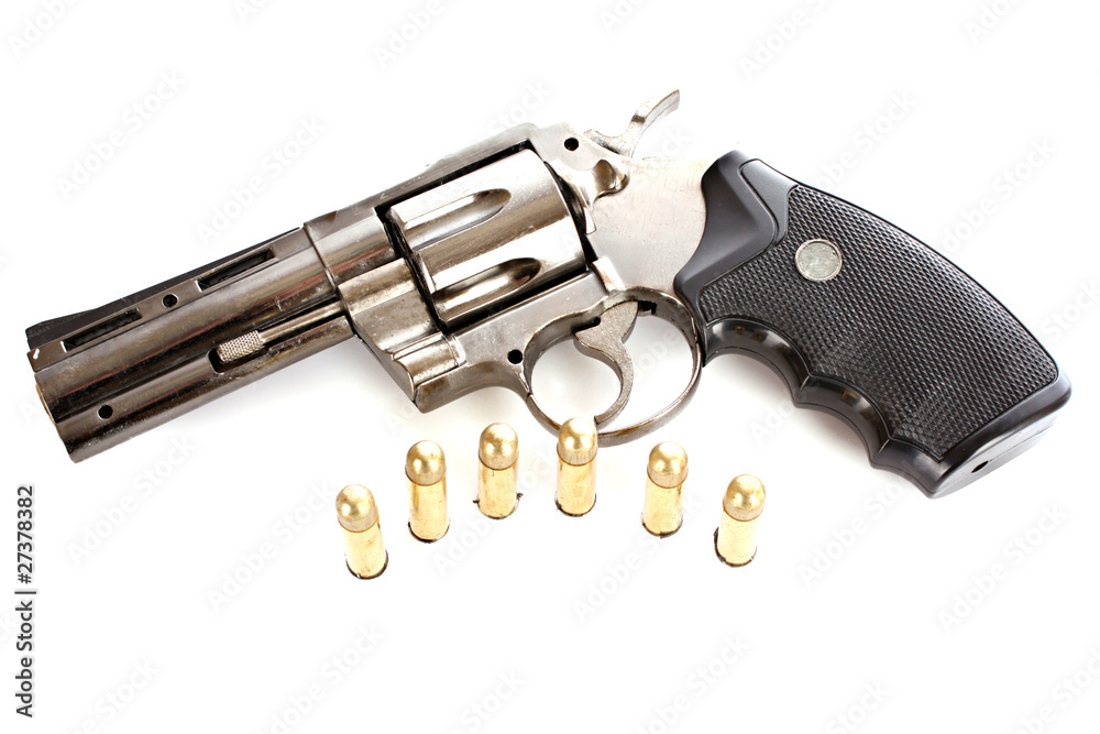 Bullets and revolver. Not real gun (lighter) Stock Photo | Adobe Stock