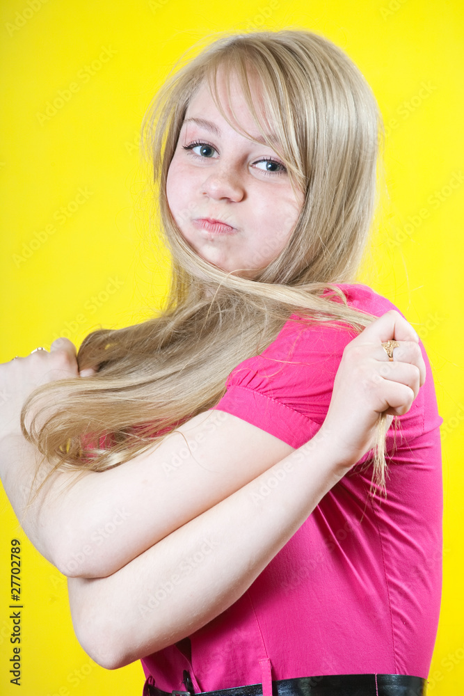 girl puffs up her cheeks Stock Photo | Adobe Stock