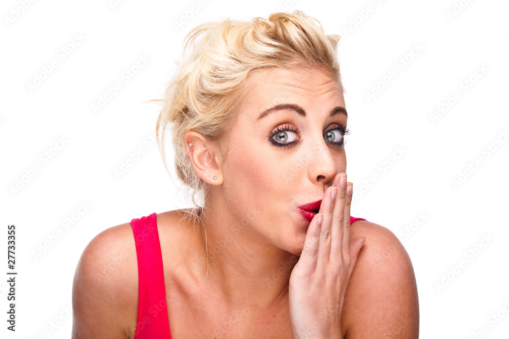 Speak no evil - Woman giving cheeky 'it's a secret' expression Stock ...