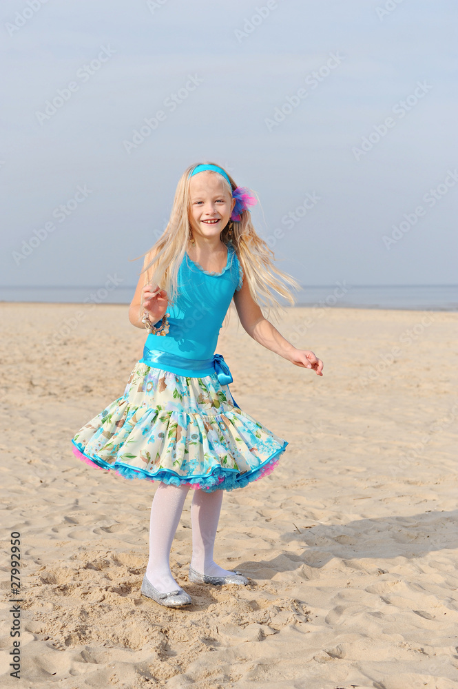 Little girl turning around Stock Photo | Adobe Stock
