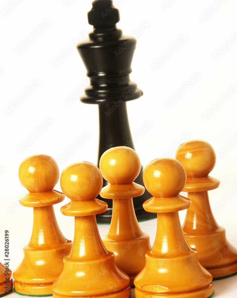 chess game over wood chart.queen cornered. Stock Photo | Adobe Stock