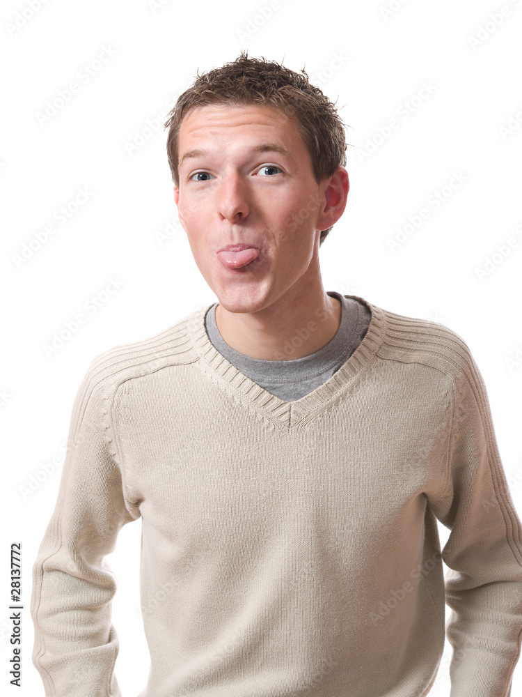 young mocking man sticking out tongue isolated over white foto de Stock ...