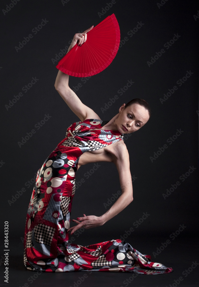 flamenco dancer in pose with red fan Stock Photo | Adobe Stock