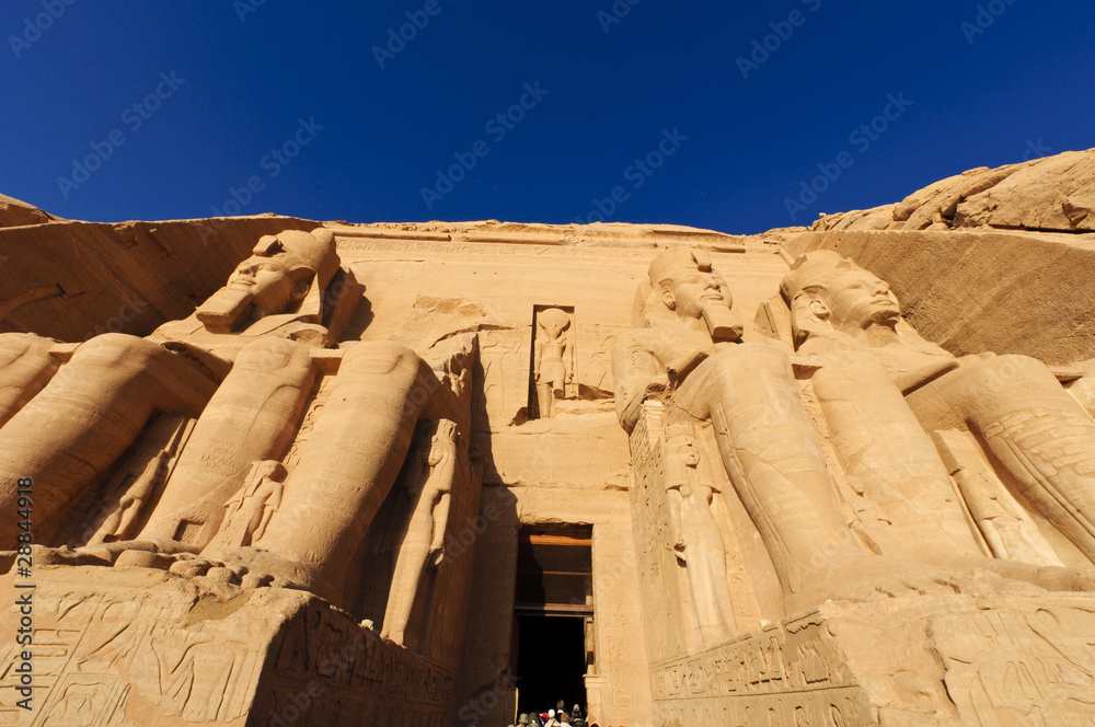 The colossi of Ramses at The Great Temple of Abu Simbel, Egypt Stock ...