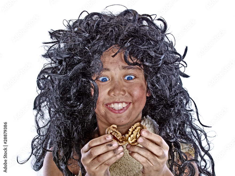 neanderthal child opening a cracked walnut Stock Photo | Adobe Stock