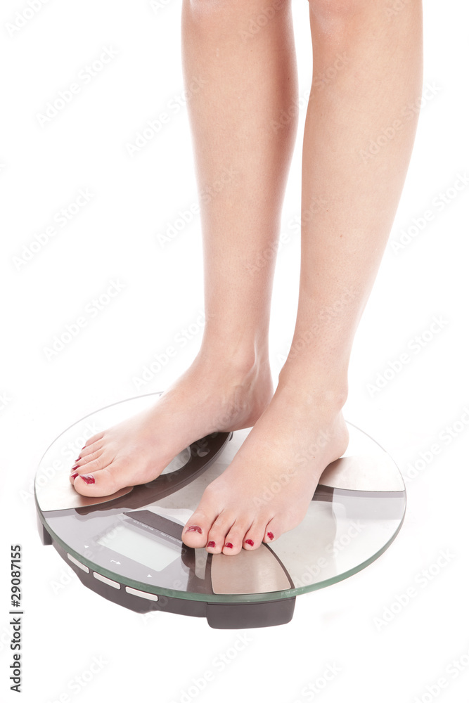 Womans feet scales angle Stock Photo | Adobe Stock